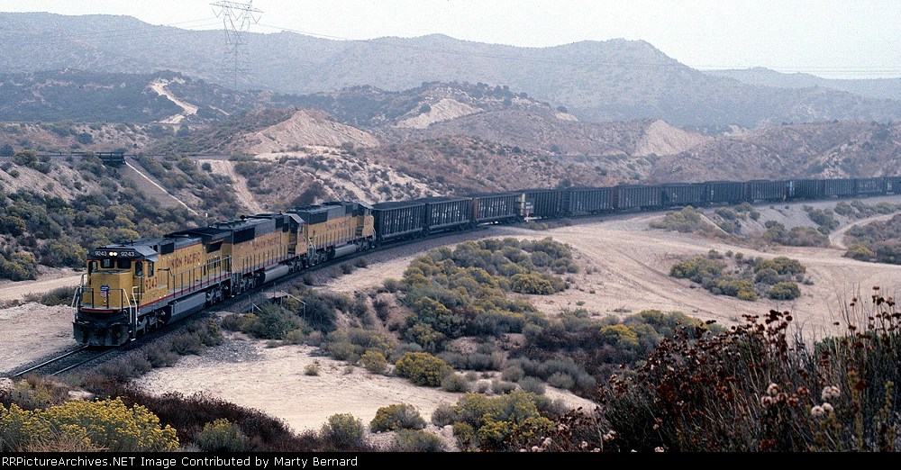 (1) UP 9243, 6008, and 6242 Working Down the Pass